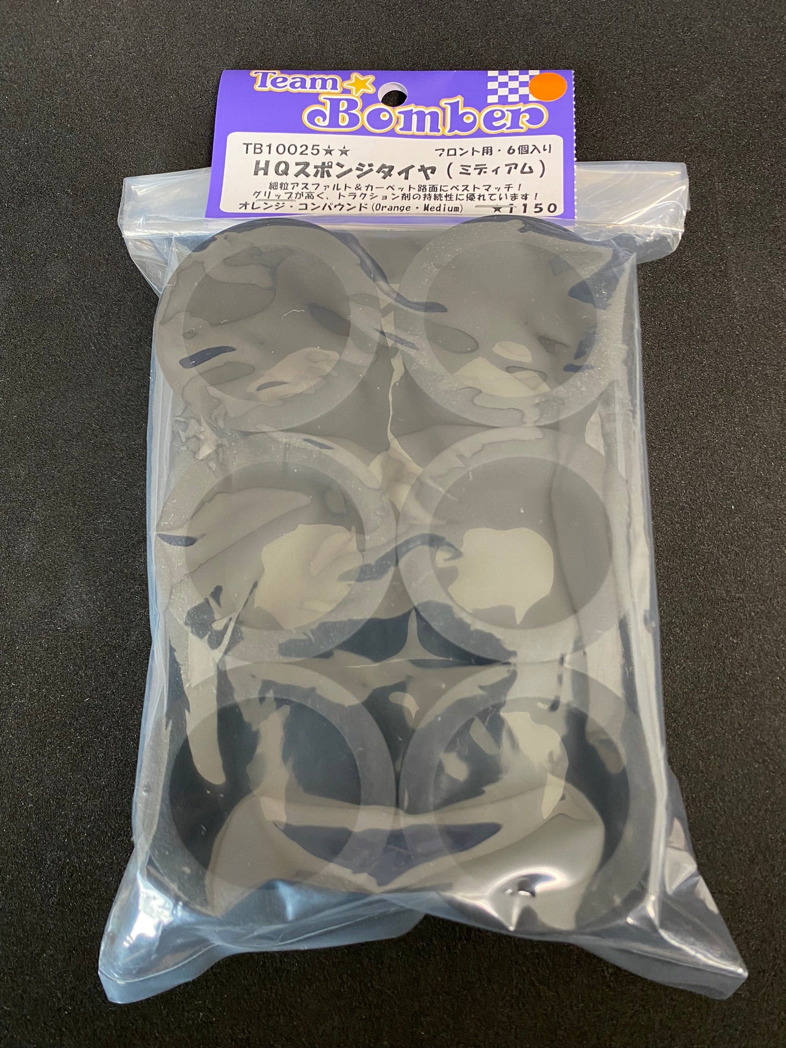 TB10025A Team Bomber HQ Tire - Orange, Medium, Front – SRF ONLINE STORE